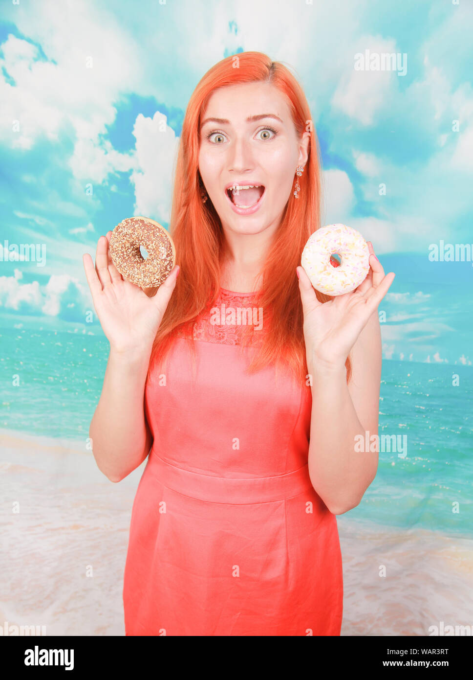 pretty cute red haired woman with sweet tasty food enjoy so much Stock Photo - Alamy