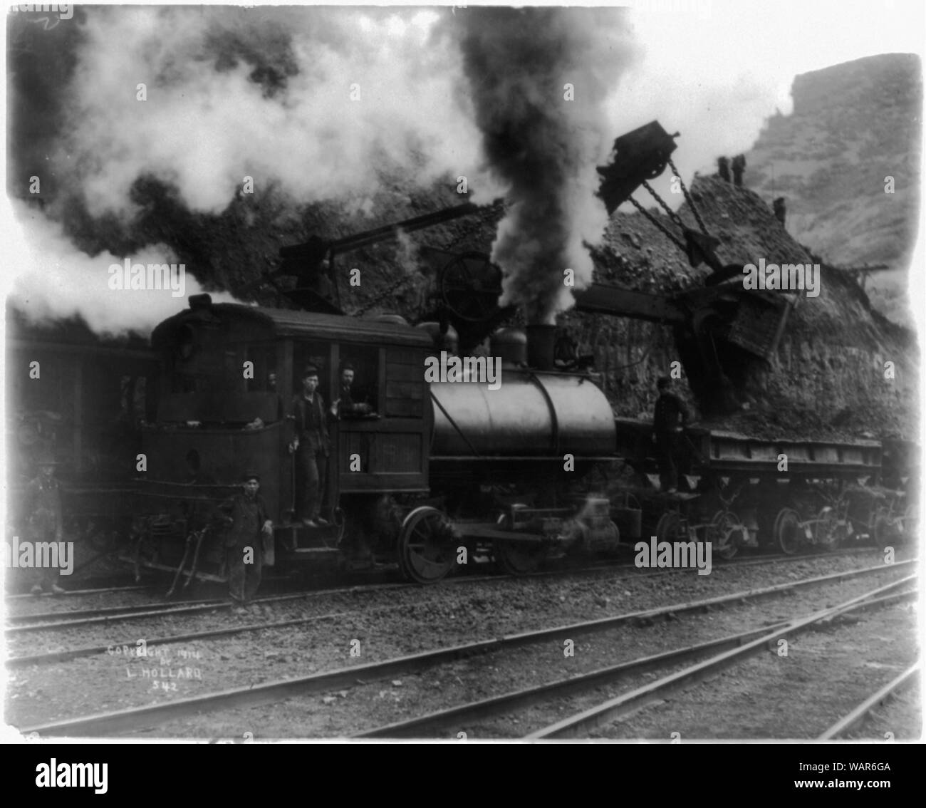 Dinkey engine and steam shovel Stock Photo - Alamy