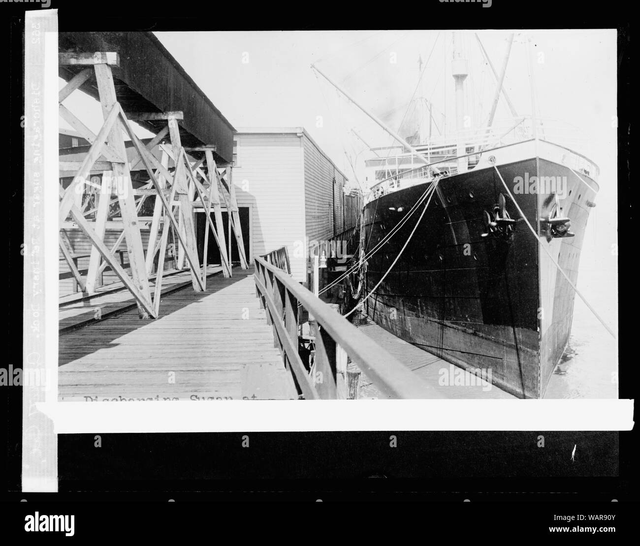 Dishcraging [Discharging?] sugar at Refinery Dock, Crockett, Cal Stock ...