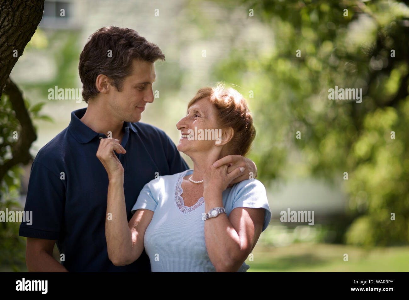 Portrait of two people engaged in a pleasant conversation Stock Photo ...