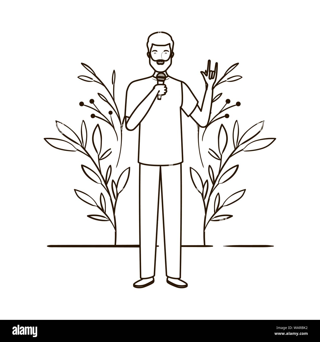 silhouette of man with microphone and branches and leaves in the ...