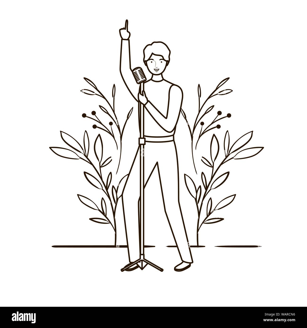 silhouette of man with microphone and branches and leaves in the ...