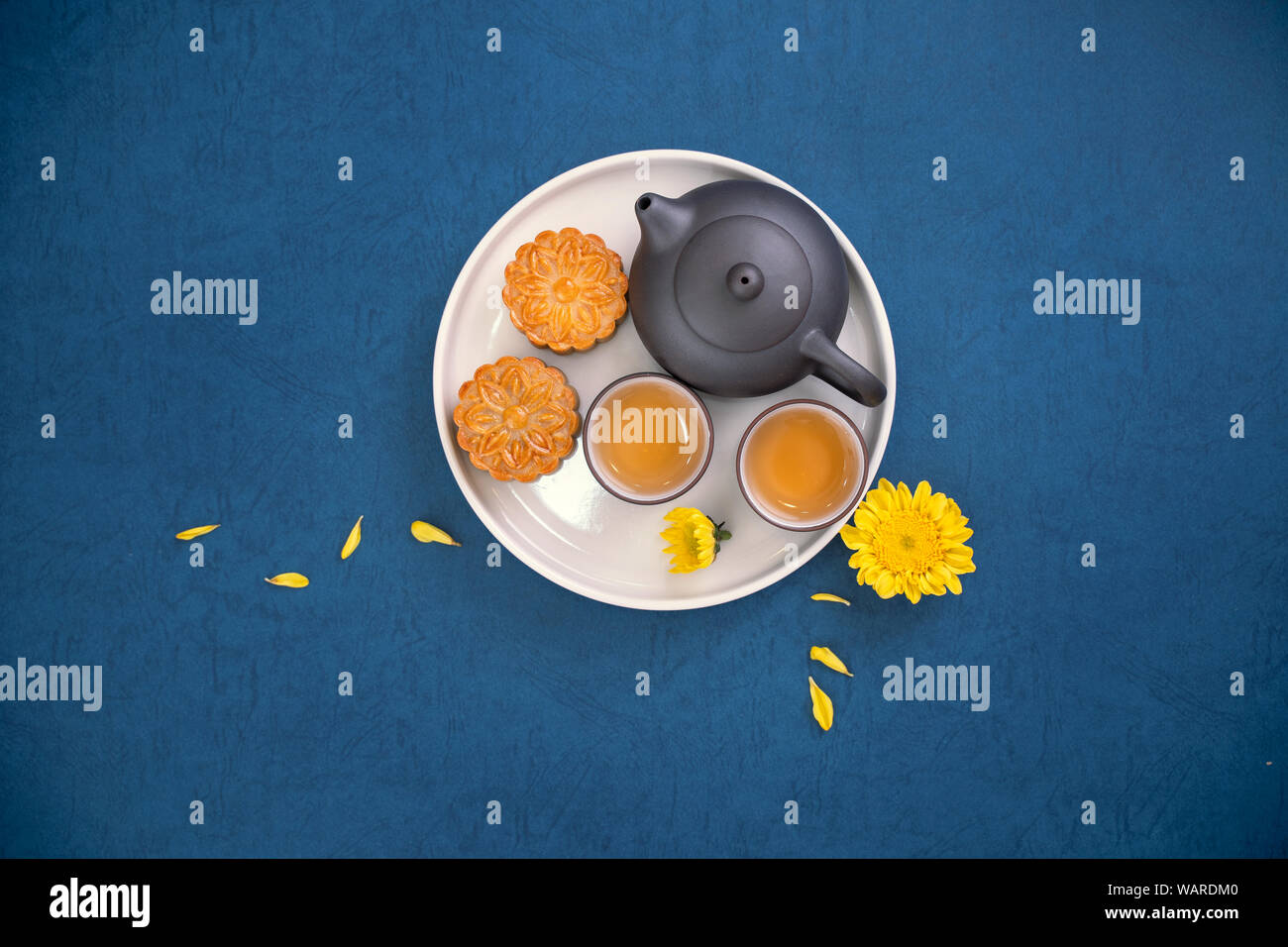 Minimal simplicity layout moon cakes on blue background for Mid-Autumn ...