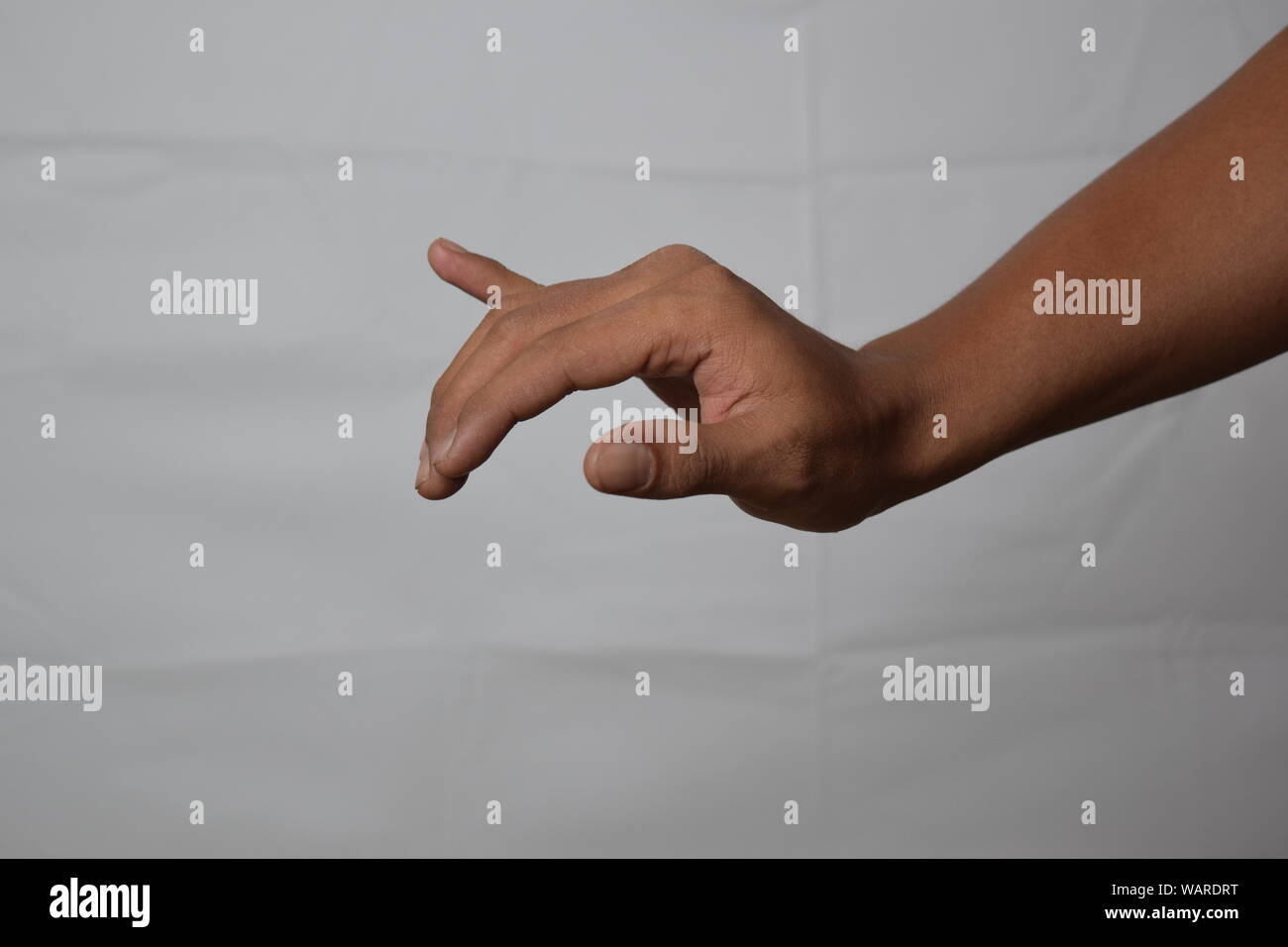 Close up Asian man shows hand gestures it means Let's Go isolated on ...