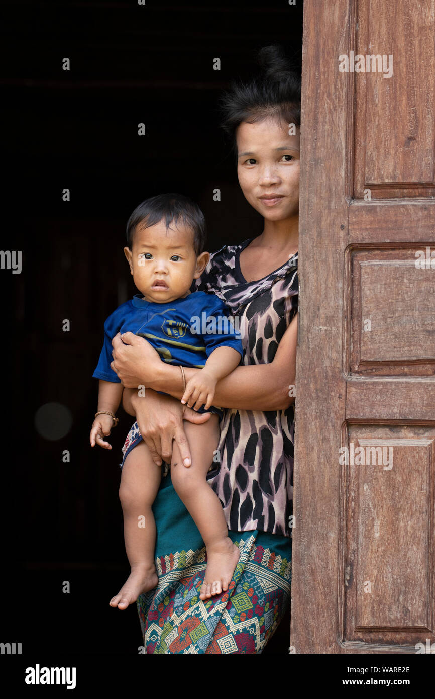 Asia, Asien, Southeast Asia, Laos, local woman with child along Mekong ...