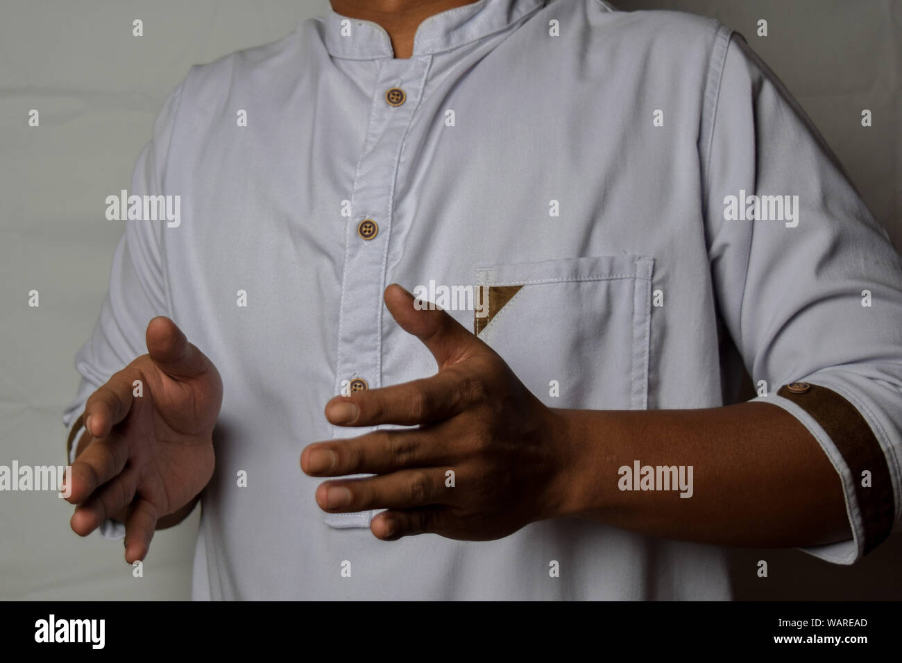Close up Asian man shows hand gestures it means human emotion and ...