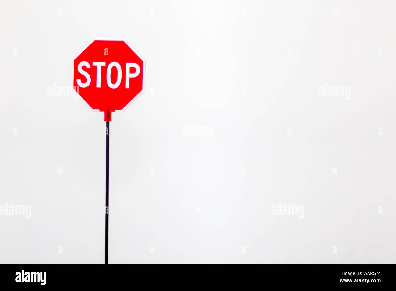 Red Stop Sign on a white background Stock Photo - Alamy