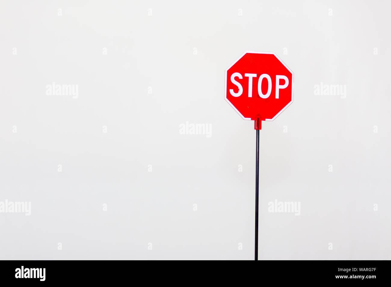 Red Stop Sign on a white background Stock Photo - Alamy