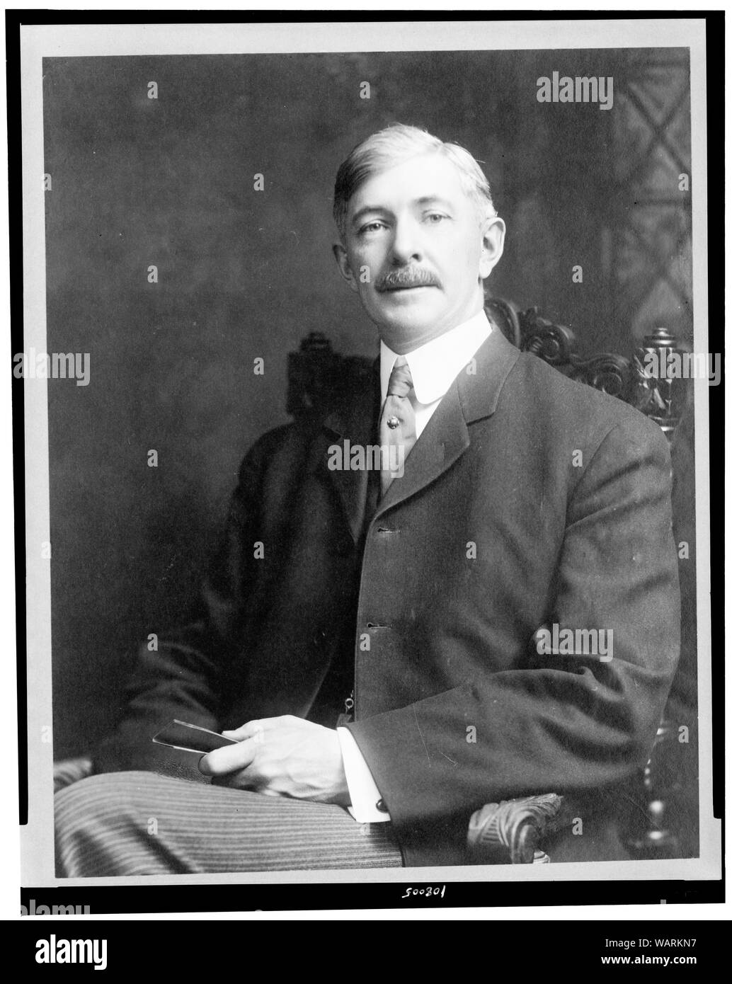 Dr. Albert Shaw, three-quarter length portrait, seated, facing slightly ...