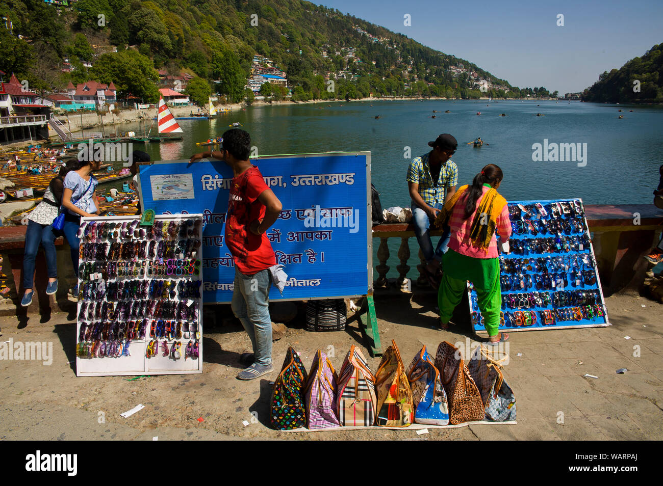 Indian people selling eyeglasses at the shores of Nainital Lake ...