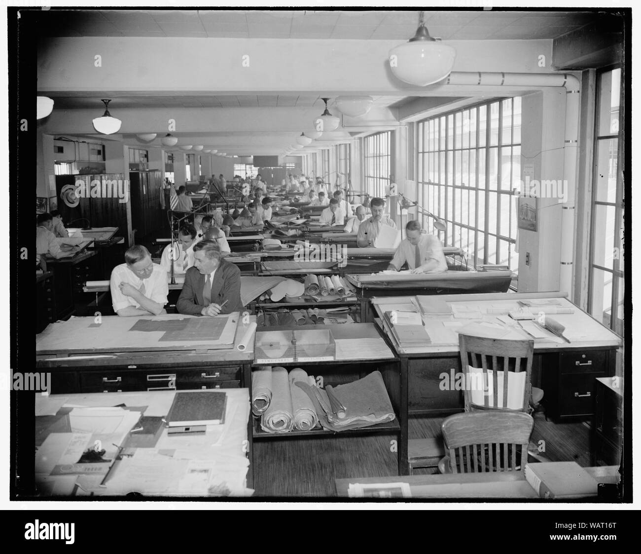 Drawing plans for the new building program. Washington, D.C., June 6. A ...