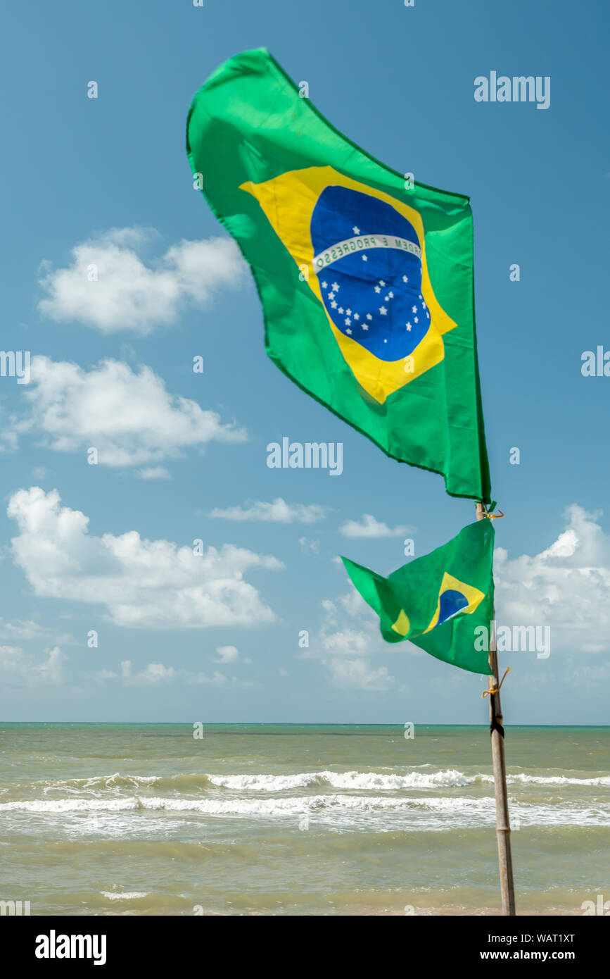 Beautiful Brazilian National Flag Waving in a blue sky day background ...