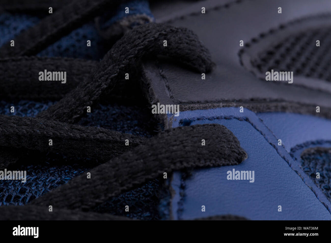 Fragment of a black sneaker close up. Sneaker texture Stock Photo - Alamy