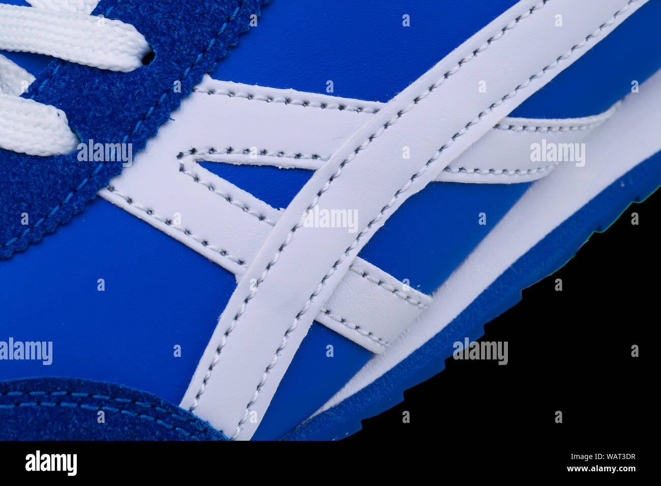 A fragment of a blue sneaker close up. Sneaker texture Stock Photo - Alamy