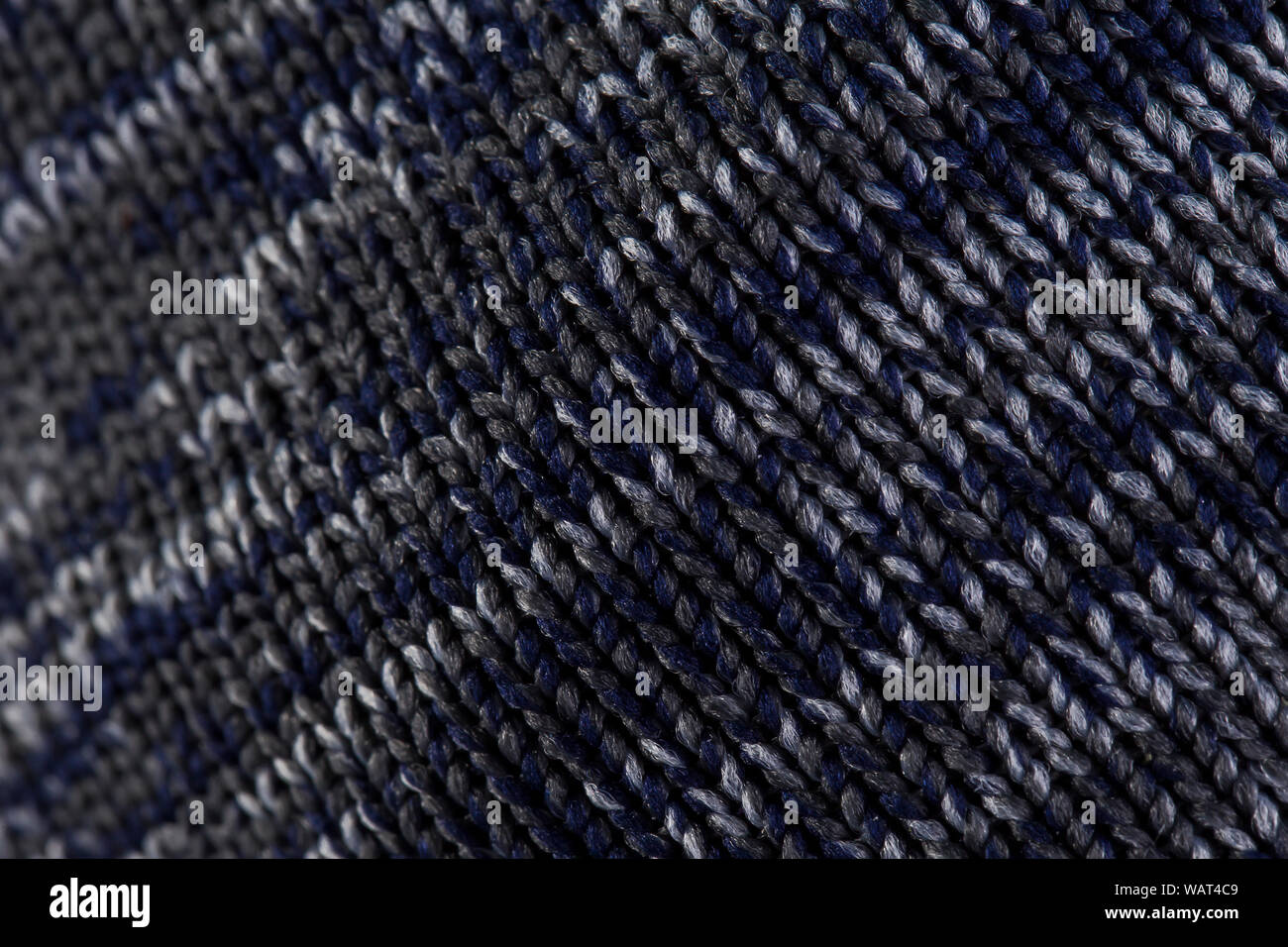 Fragment of black and white fabric sneaker. The texture of the material ...