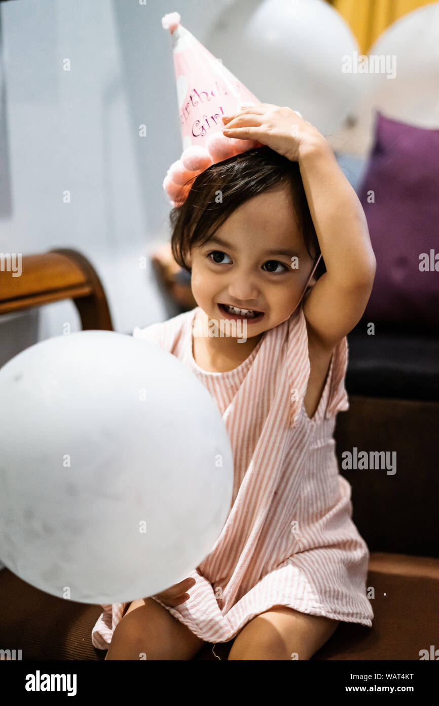 Asian girl with a hat hi-res stock photography and images - Alamy