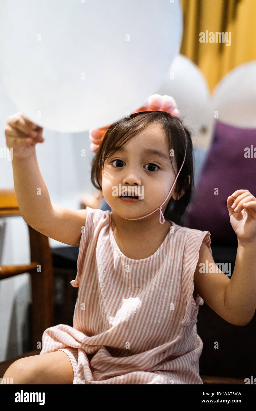 Asian girl with a hat hi-res stock photography and images - Alamy