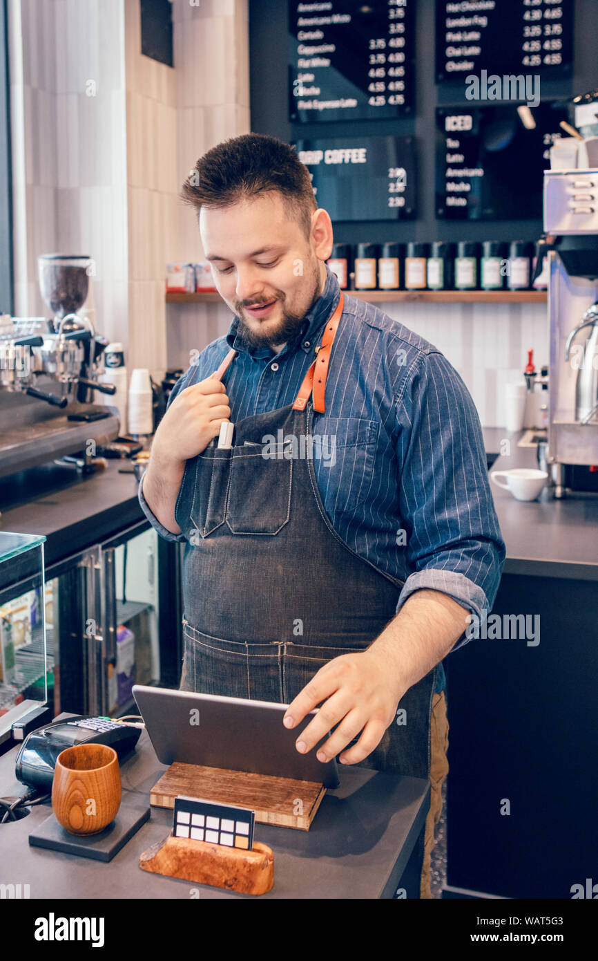 Cashier barista hi-res stock photography and images - Alamy