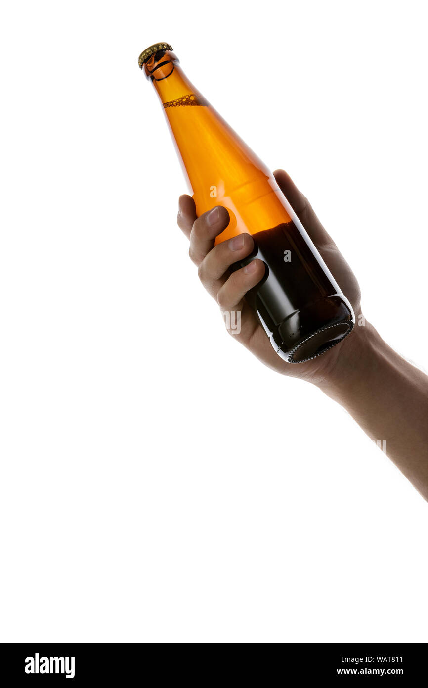 male hand holding brown beer bottle without label isolated on white ...
