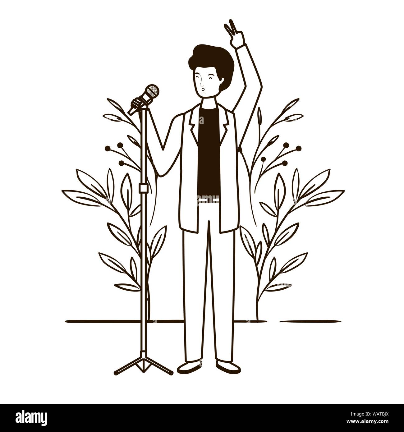 silhouette of man with microphone and branches and leaves in the ...