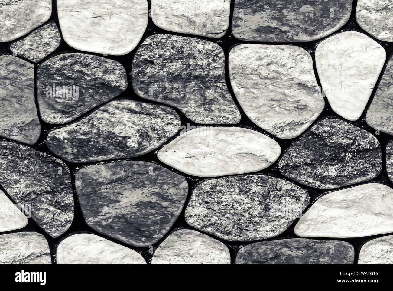 Wall of small stone texture background. endless seamless background ...
