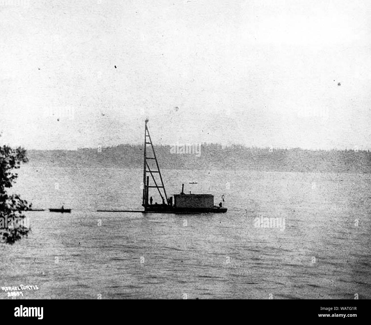 Driving the first piling for the Seattle & Walla Walla Railroad ...