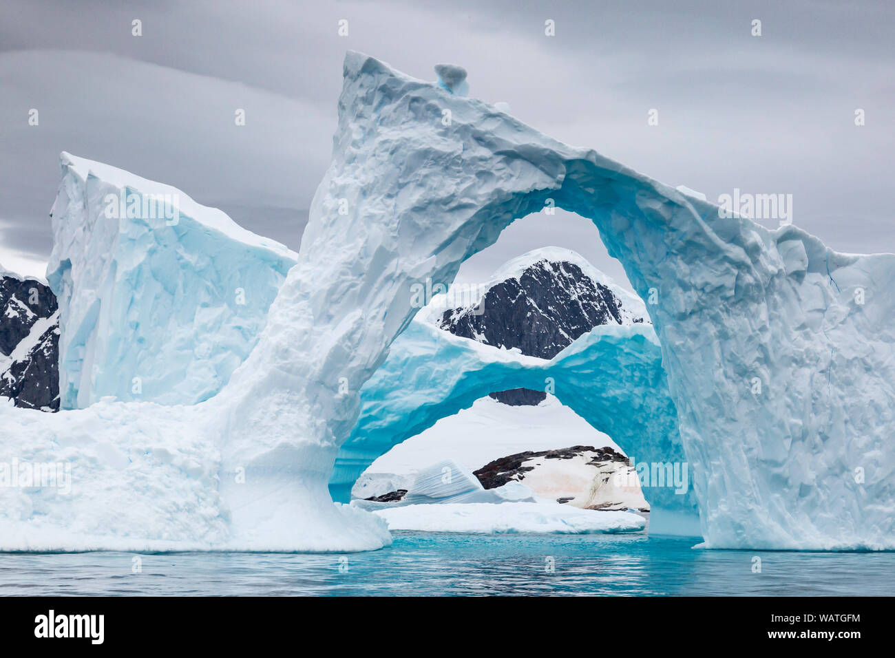 Double Arch iceberg at the Useful Islands, Antarctica Stock Photo - Alamy