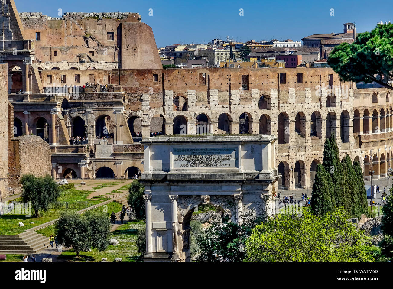 Arch of titus and the colosseum in rome hi-res stock photography and ...