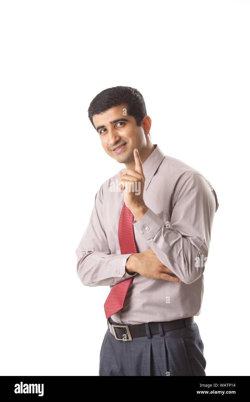 Businessman pointing upward Stock Photo - Alamy