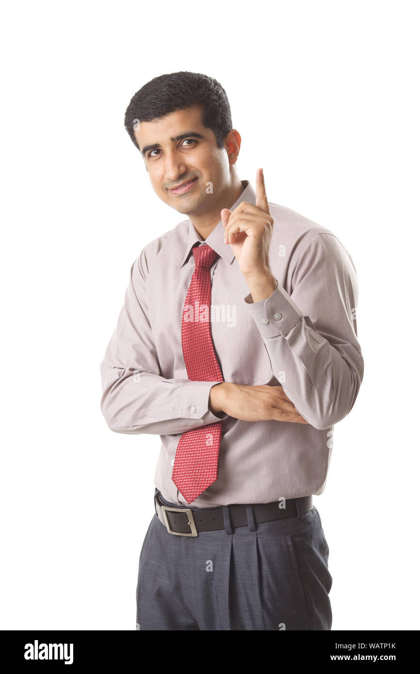 Happy businessman pointing index hi-res stock photography and images ...