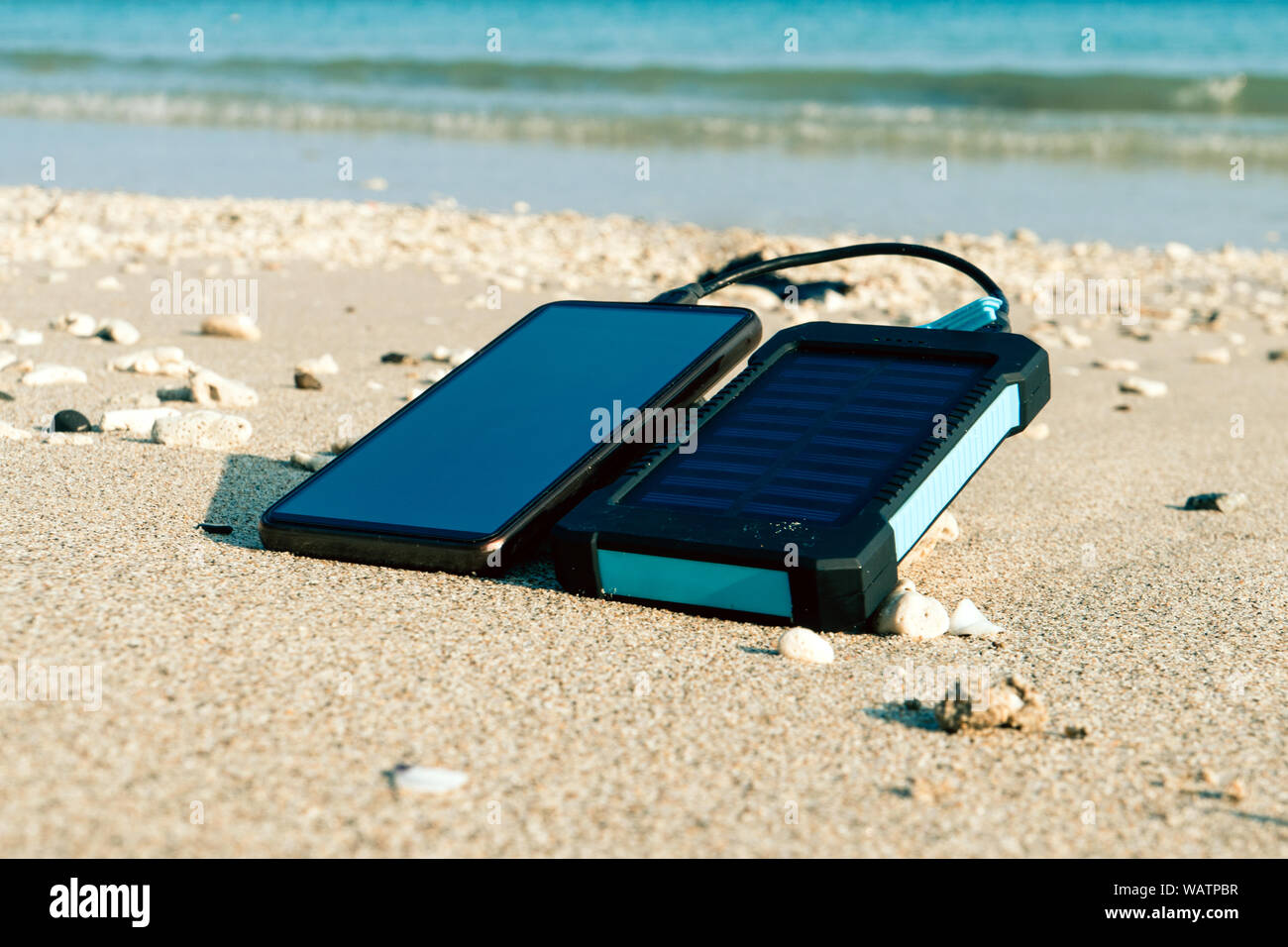 Alternative energy source. battery is charged by solar energy. Charging ...