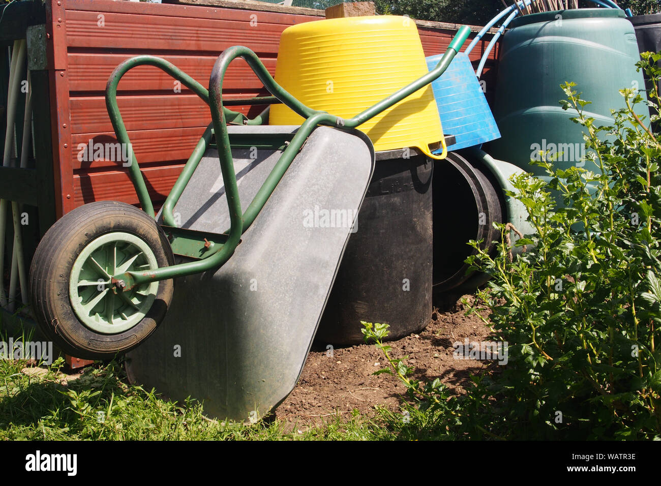 An assorted collection of allotment bins, buckets and compost ...