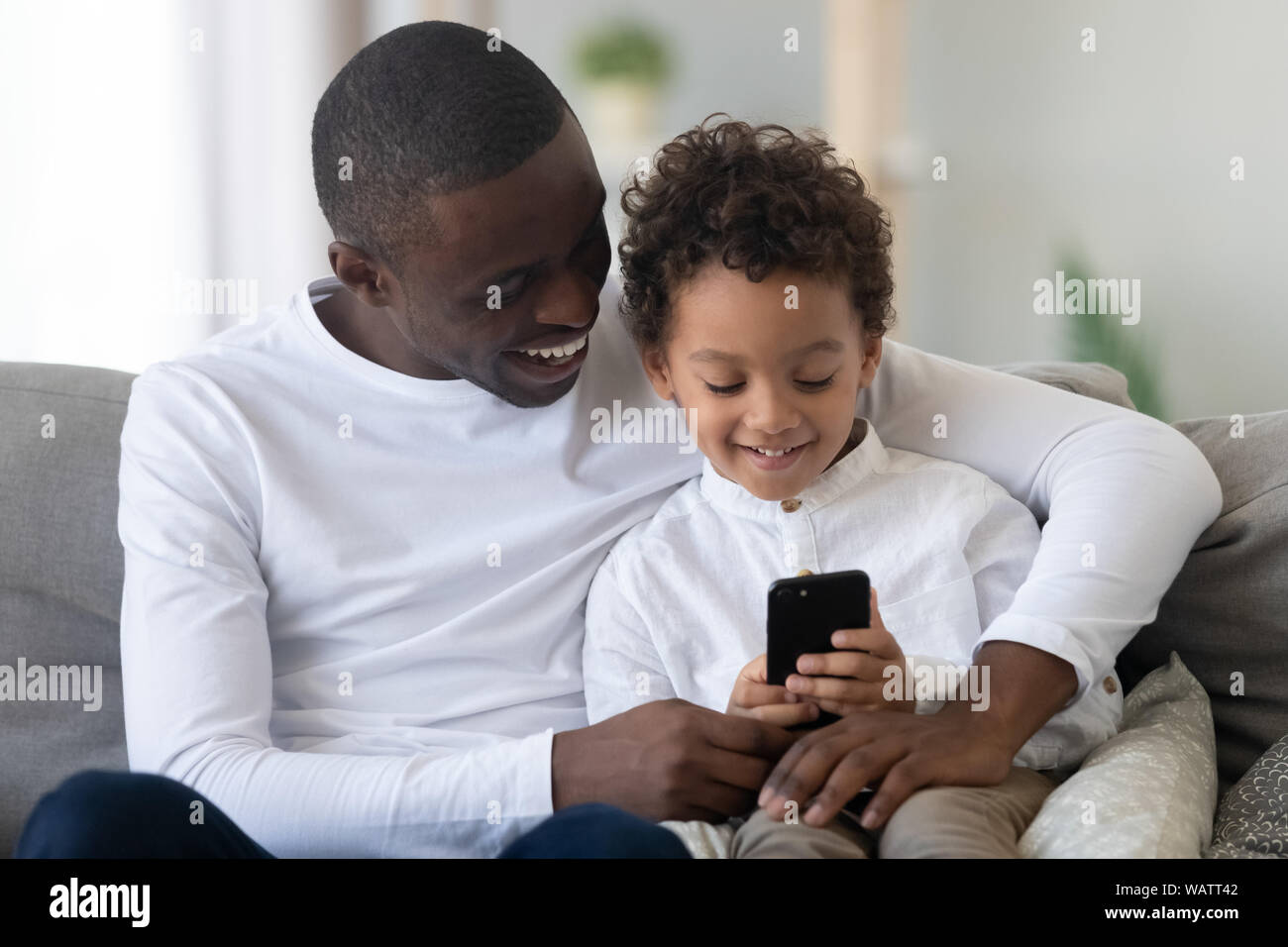 Black parent teaching child hi-res stock photography and images - Alamy
