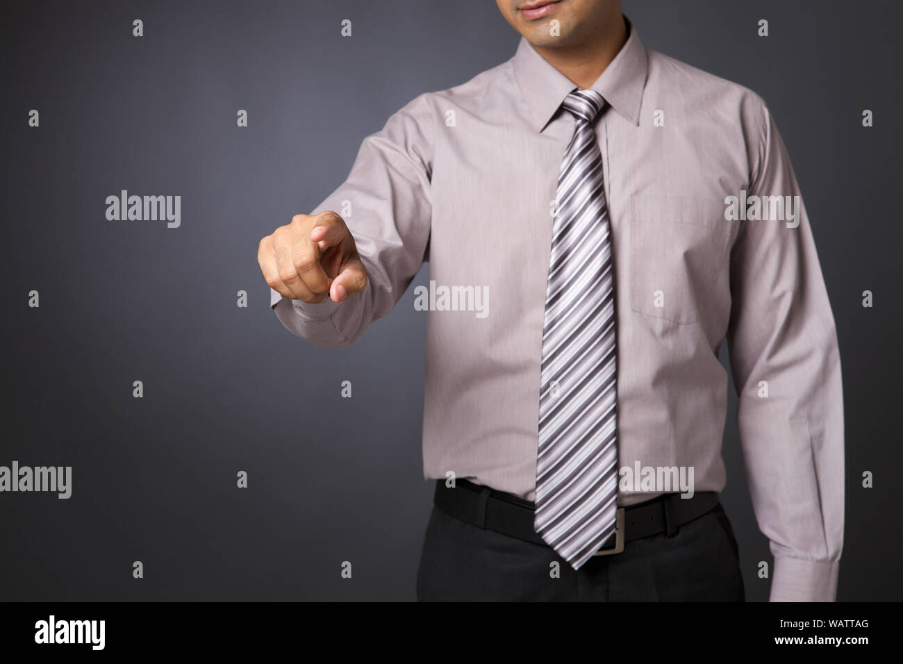 Businessman pretending to work on touch screen Stock Photo - Alamy