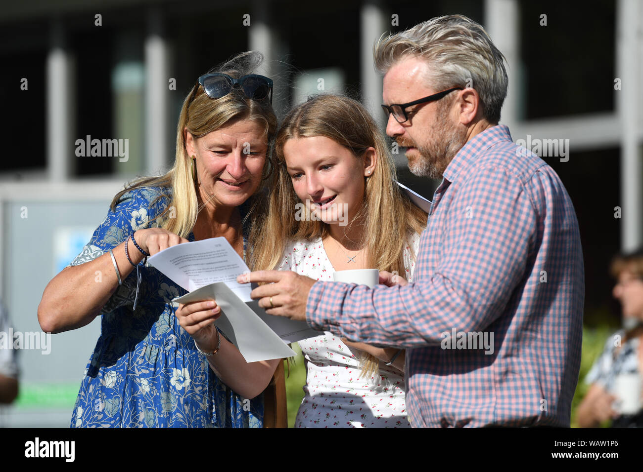 Kitty Taylor and her parents look at her GCSE results at Norwich School ...