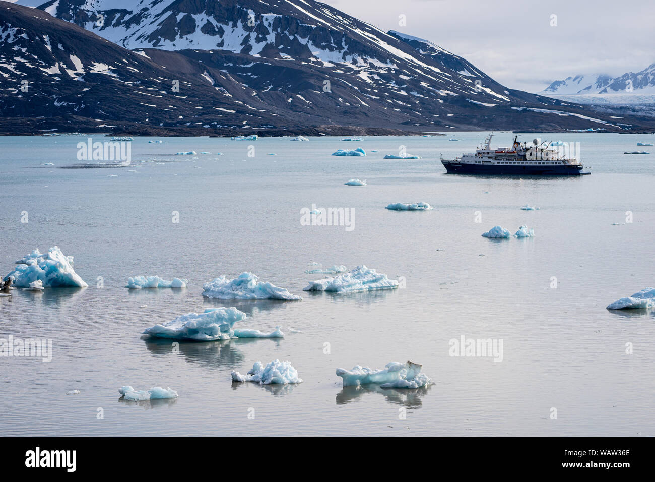 A ship in the Arctic sea ice in Svalbard, Norway in June Stock Photo ...