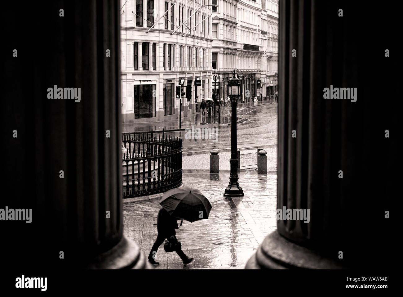 Man running hiding rain hi-res stock photography and images - Alamy
