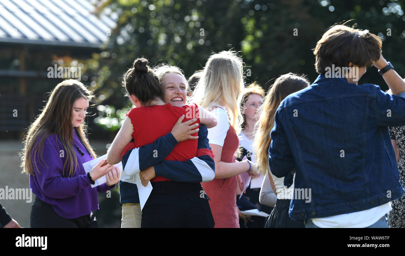 Amelia Arclay hugs Lucy Cox as they celebrate with their GCSE results ...
