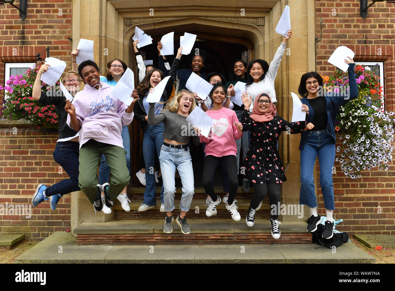 Pupils celebrate with their GCSE results at King Edward VI High School ...