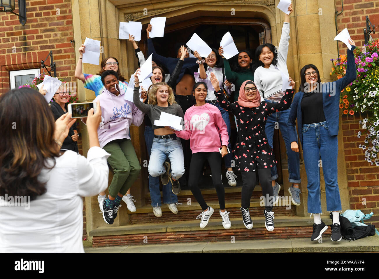 Pupils celebrate with their GCSE results at King Edward VI High School ...