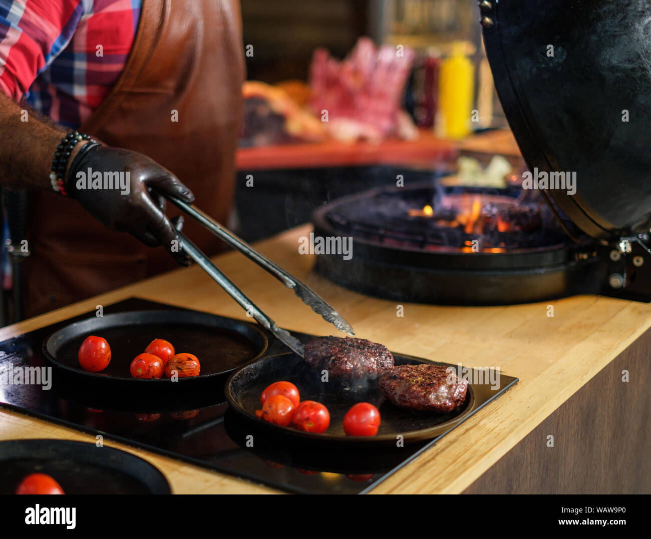 Chef serving freshly cooked meat in a restaurant Stock Photo - Alamy