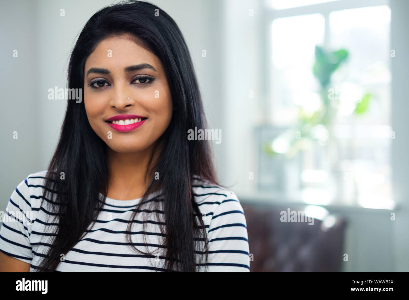 Young indian woman face close-up Stock Photo - Alamy