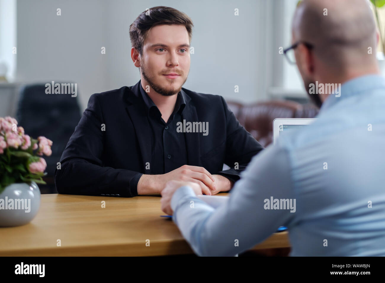 Confident man attending job interview Stock Photo - Alamy