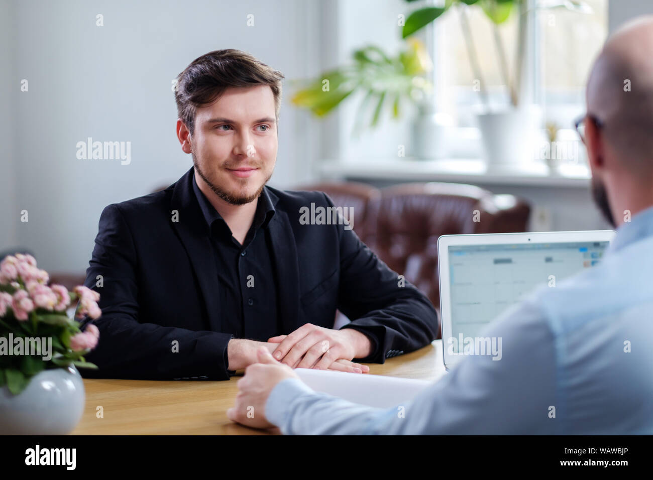 Confident man attending job interview Stock Photo - Alamy
