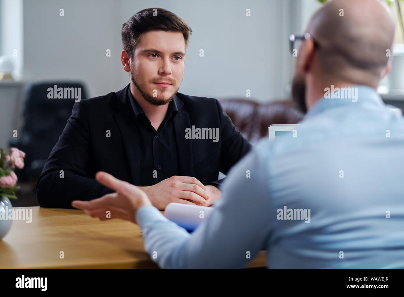 Confident man attending job interview Stock Photo - Alamy
