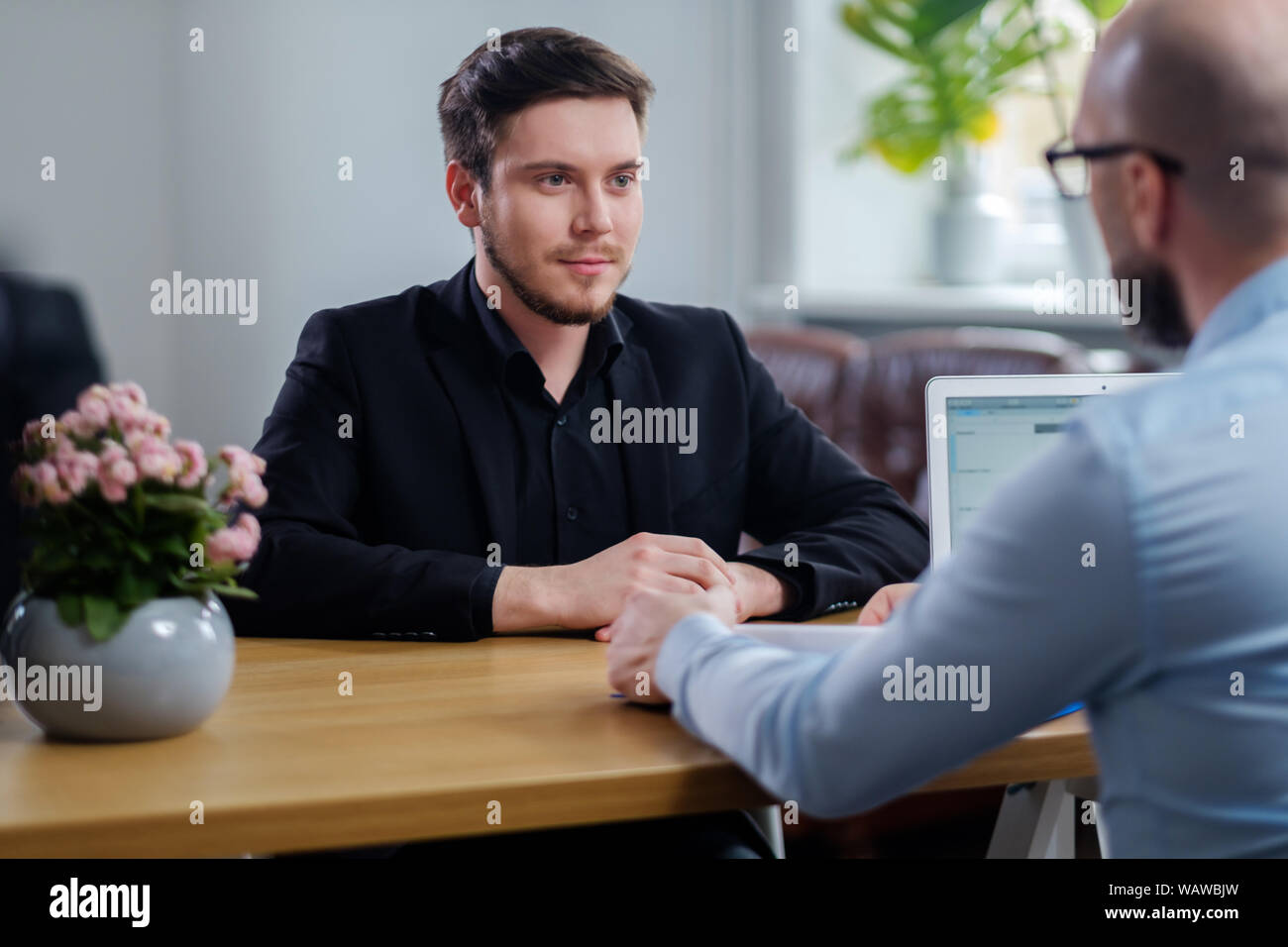 Confident man attending job interview Stock Photo - Alamy