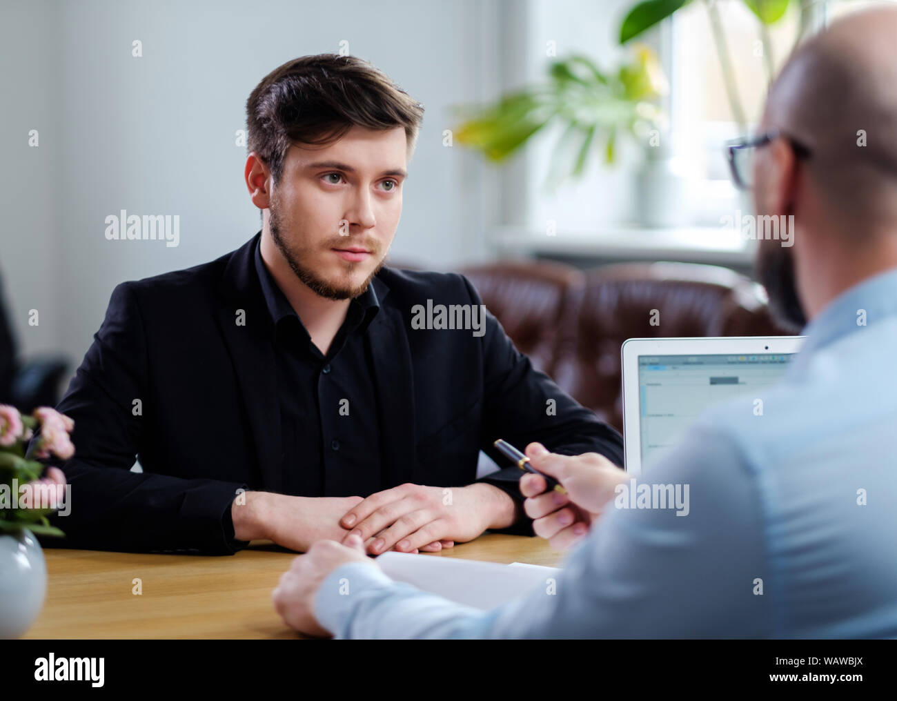 Confident man attending job interview Stock Photo - Alamy