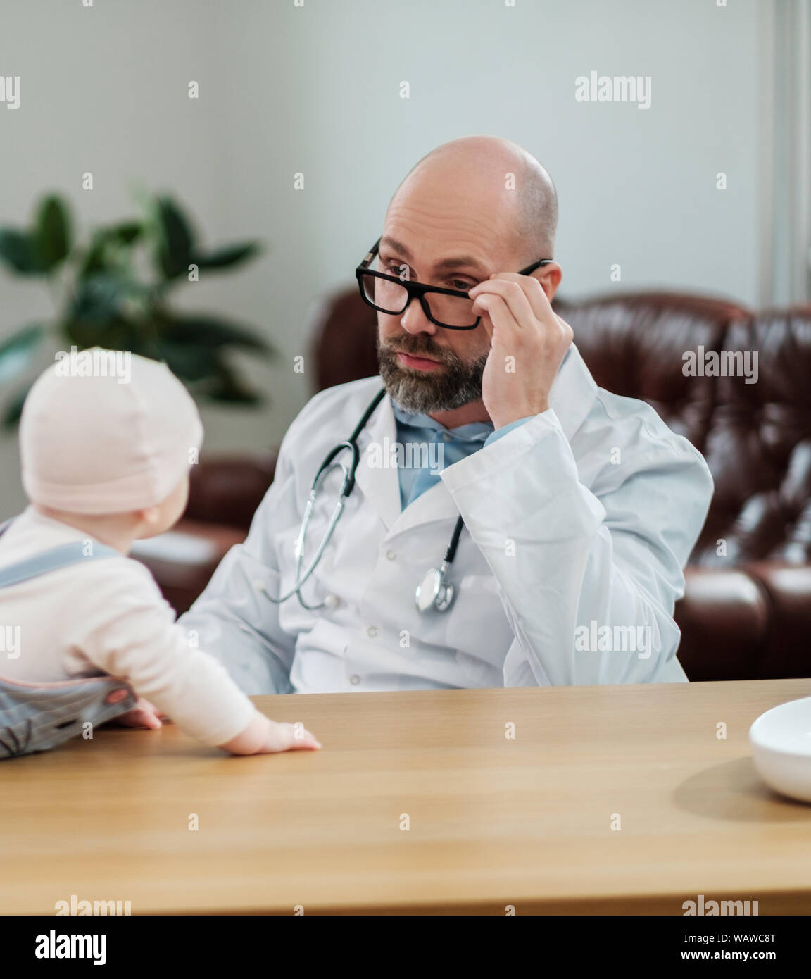 Little baby at pediatrician practice Stock Photo - Alamy