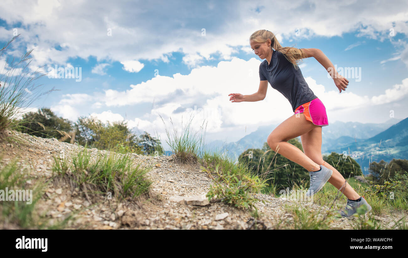 Girl running uphill hi-res stock photography and images - Alamy