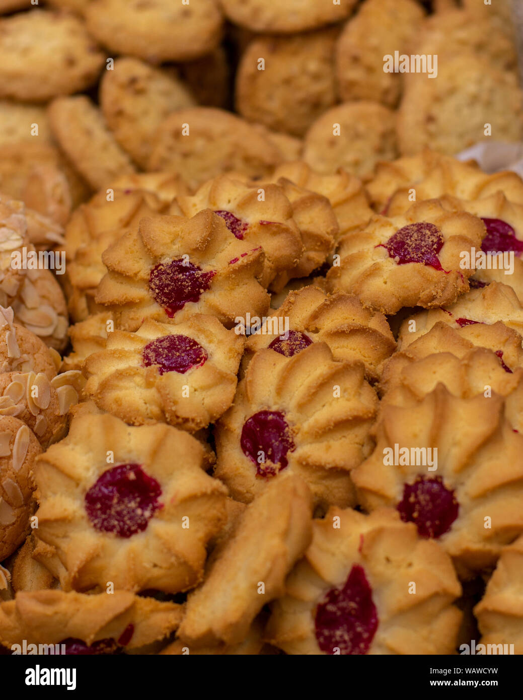 Shortbread cookies with a drop of jam, a lot of a bunch of sweet ...